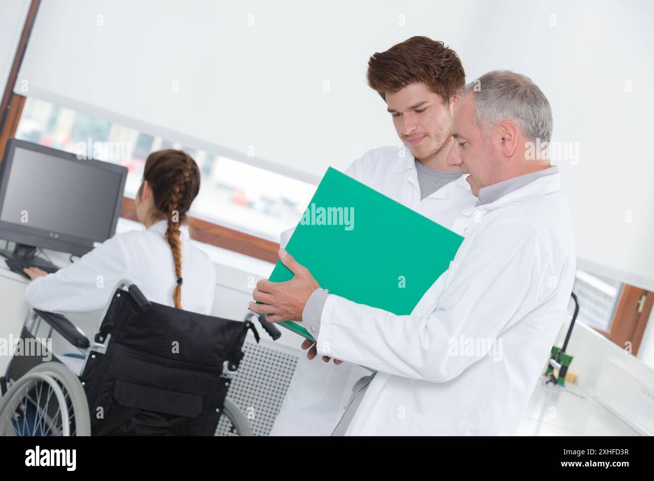 disabled student working in a lab Stock Photo - Alamy