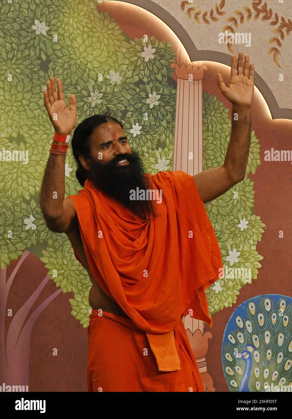 Mumbai, India. 13th July, 2024. Indian Yoga guru and businessman Baba ...