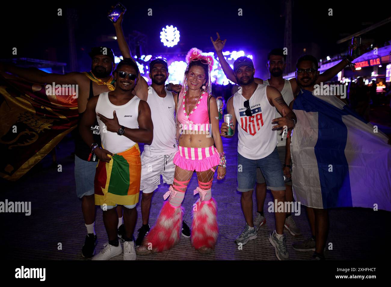 Revellers pose to photographer during second day of Ultra Europe Music ...