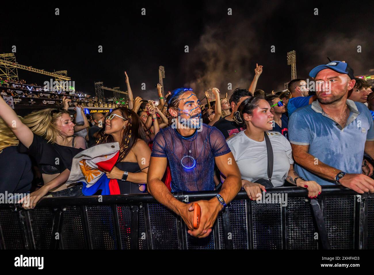 Split, Croatia. 14th July, 2024. Revellers dance as DJ Axwell performs ...