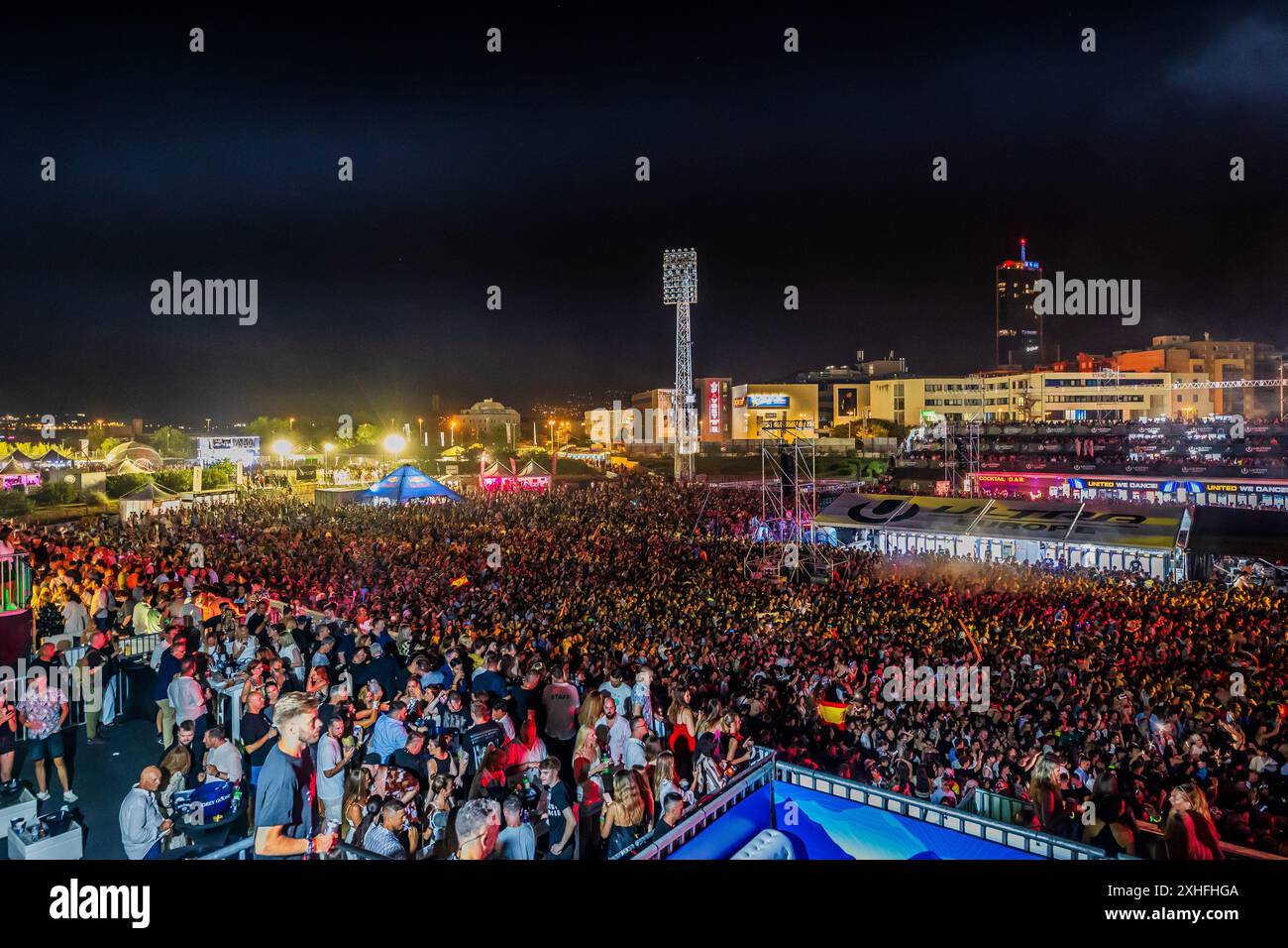 Split, Croatia. 14th July, 2024. Revellers dance as DJ Martin Garrix ...