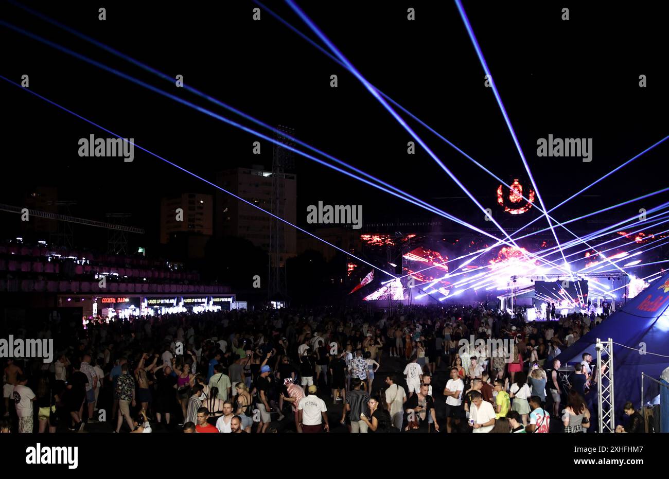 Split, Croatia. 14th July, 2024. Revellers pose to photographer during ...
