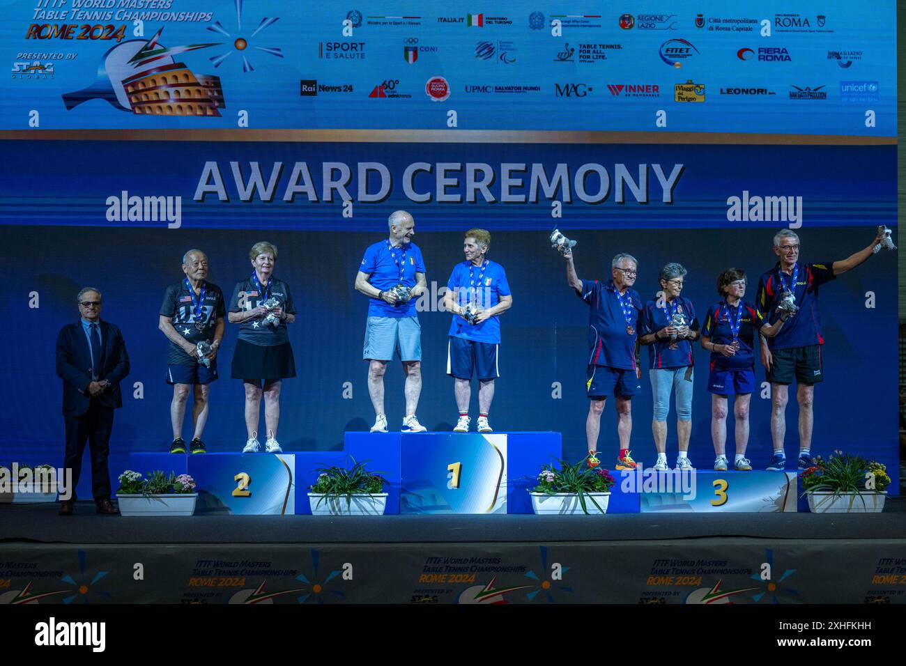 The podium of the 75 years mixed doubles category at the award ceremony ...