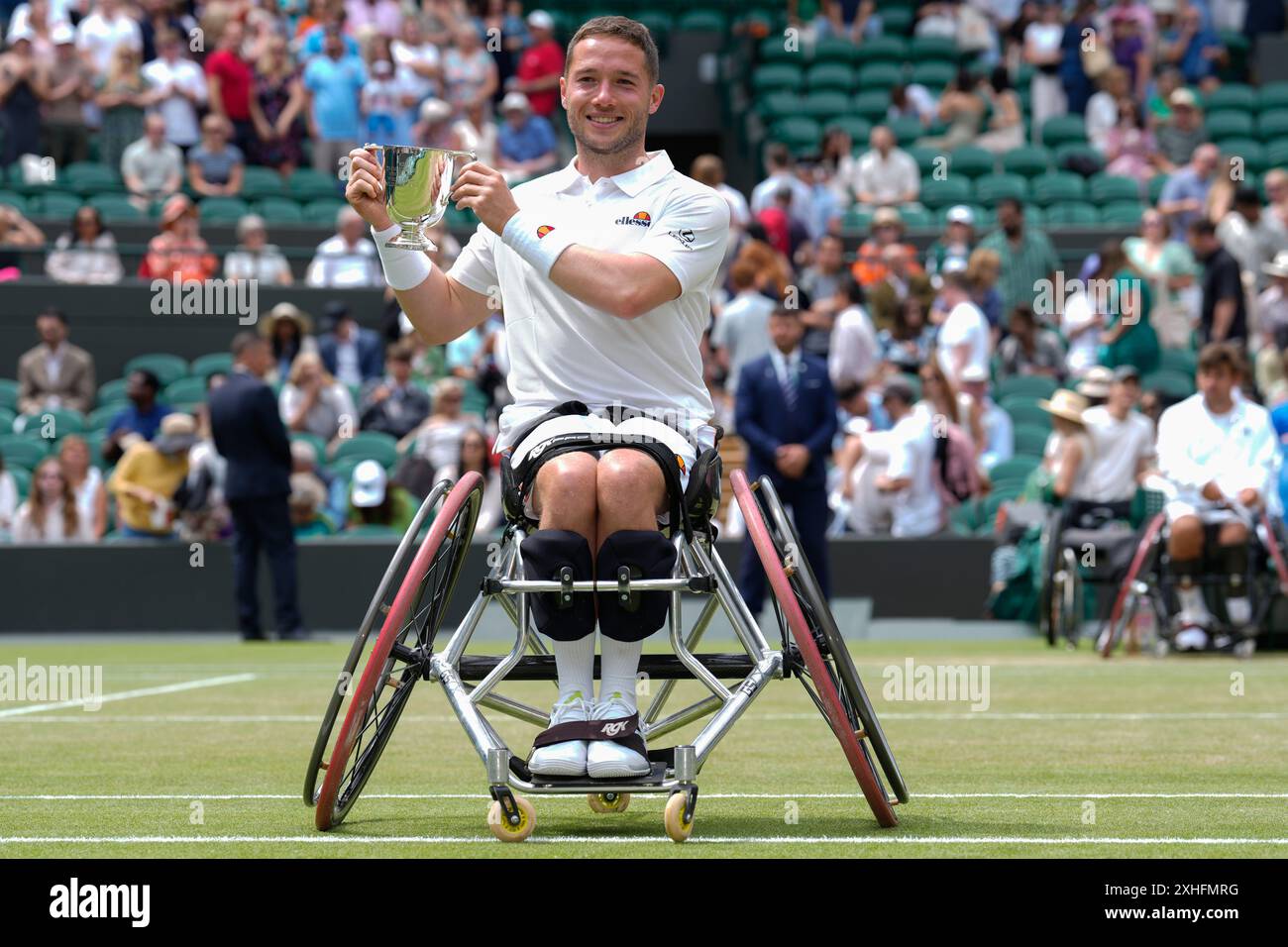 Alfie Hewett of Britain holds his trophy after defeating Martin De La ...