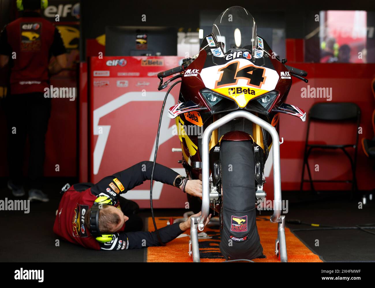 A mechanic works on Sam Lowes ELF Marc VDS Racing Team bike during day three of the MOTUL FIM ...