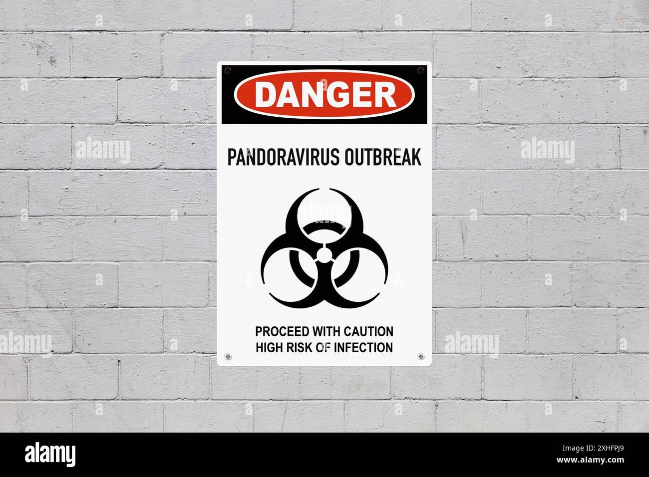 Warning sign screwed to a brick wall to warn about a health hazard. In ...