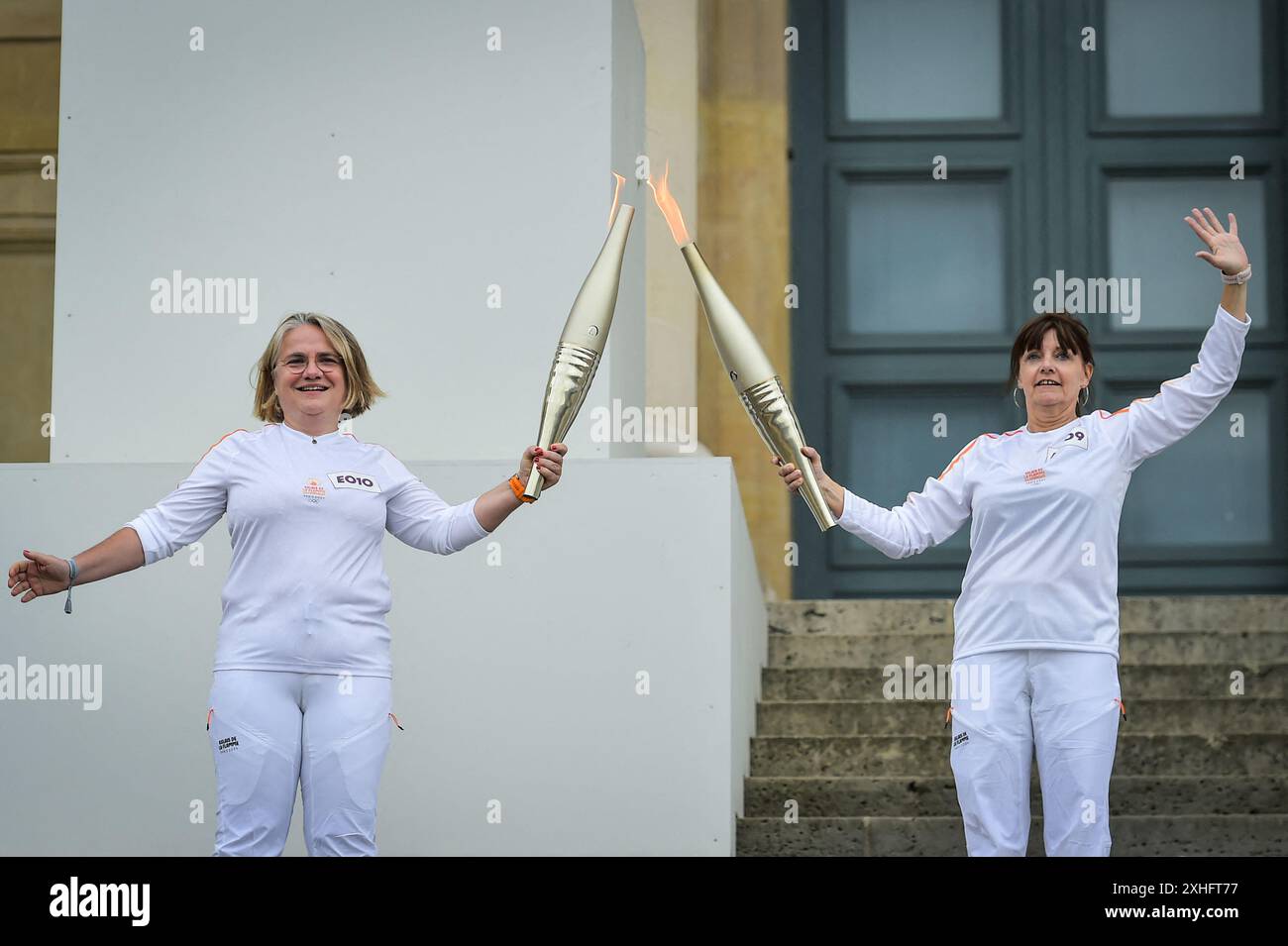 Paris, France. 14th July, 2024. Valerie Frehaut relays the Olympic ...