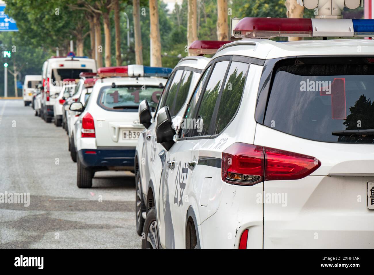 Police lights on car during traffic surveillance on the city road ...