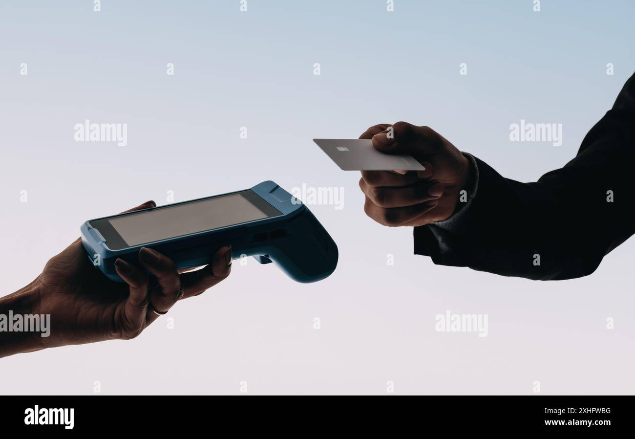 Customers use contactless payment technology at a modern checkout ...