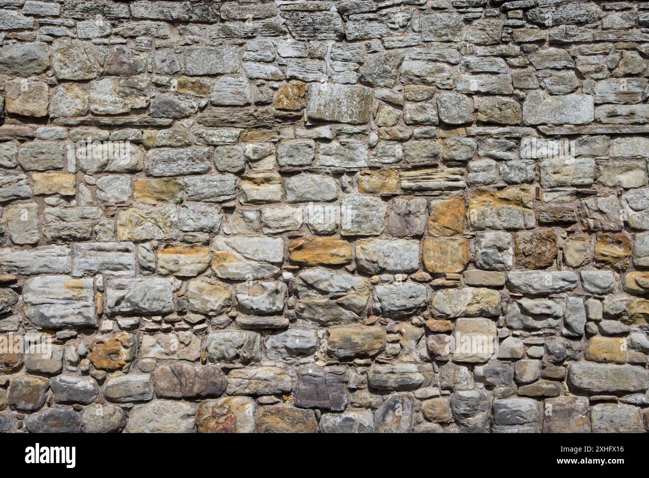 Closeup of pattern of historic medieval stone wall of The Pends, ruins ...