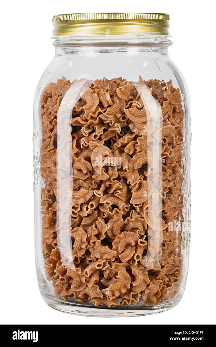 Raw paste in a glass jar with a lid isolated on white background ...