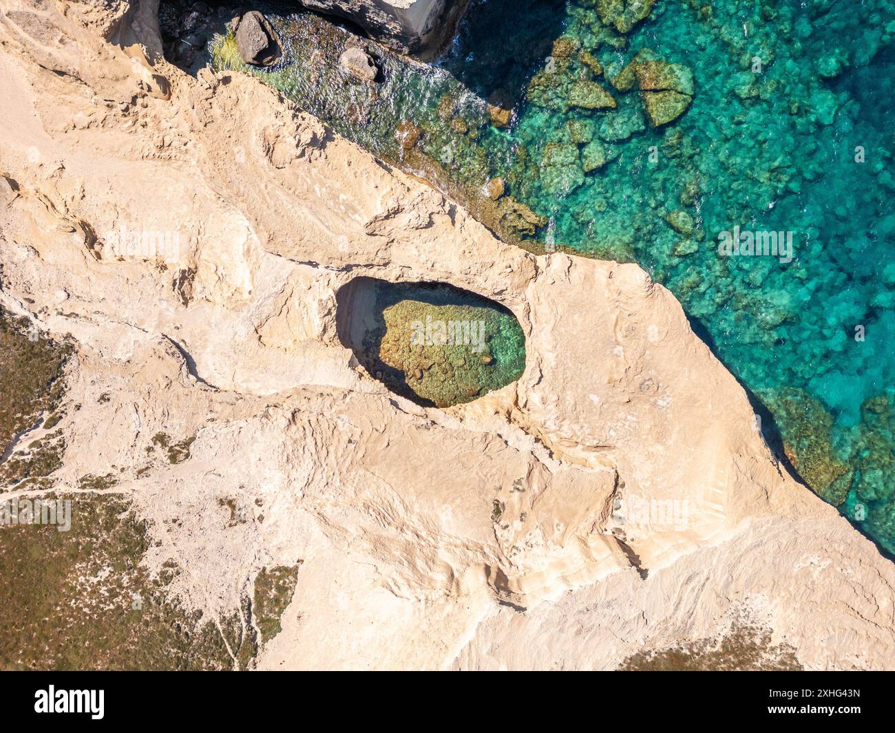 Aerial view of Grotte de Saint Antoine, a collapsed limestone cave on ...