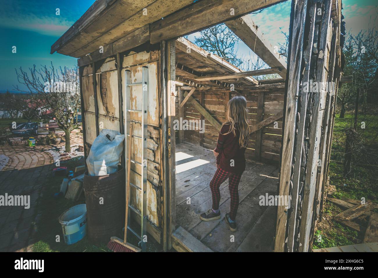 old cottage and one person Stock Photo - Alamy