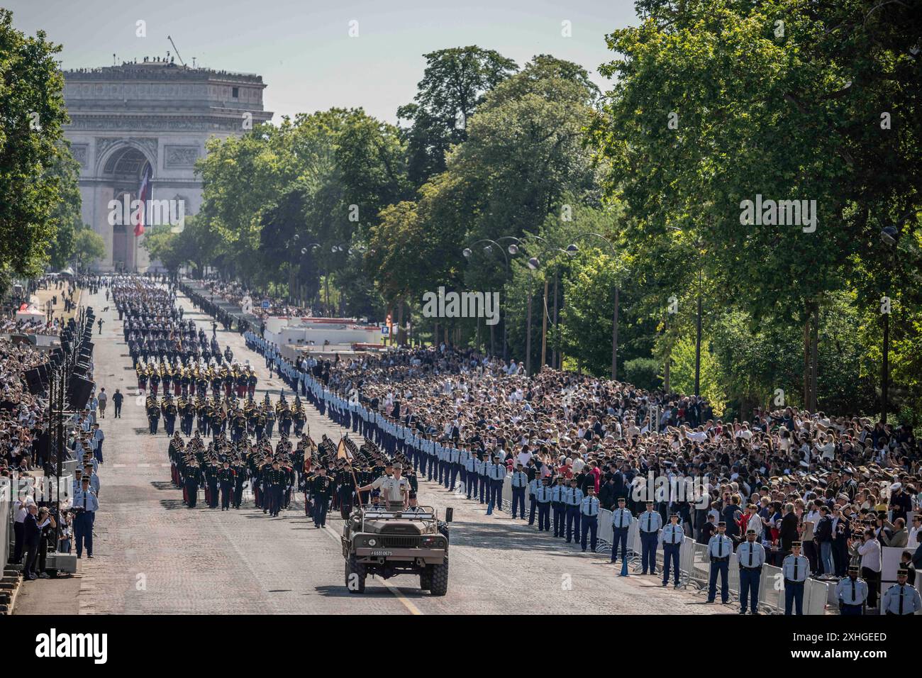 Troops march during the Bastille Day military parade along the Avenue ...