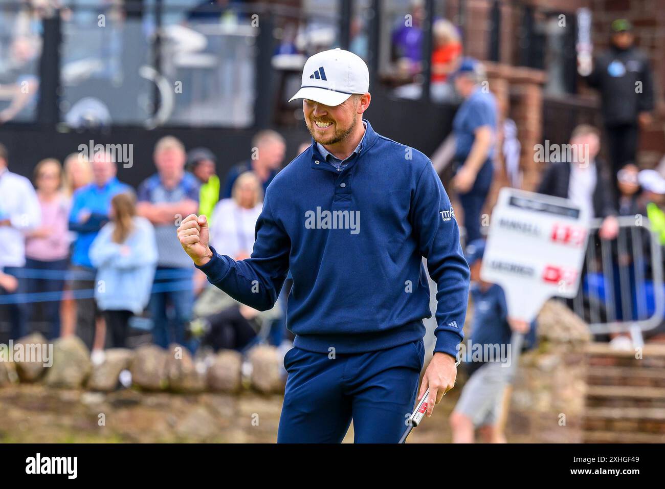 Richard Mansell celebrates on the 18th hole as he equals the course ...