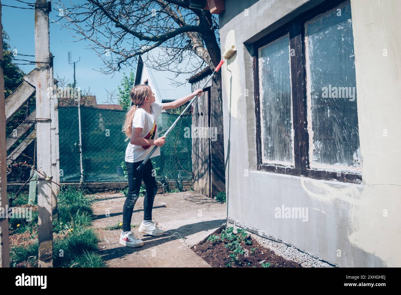 child helping by renovation of the house Stock Photo - Alamy