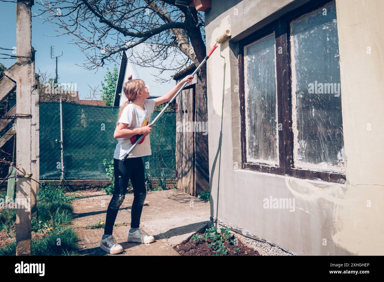 child helping by renovation of the house Stock Photo - Alamy