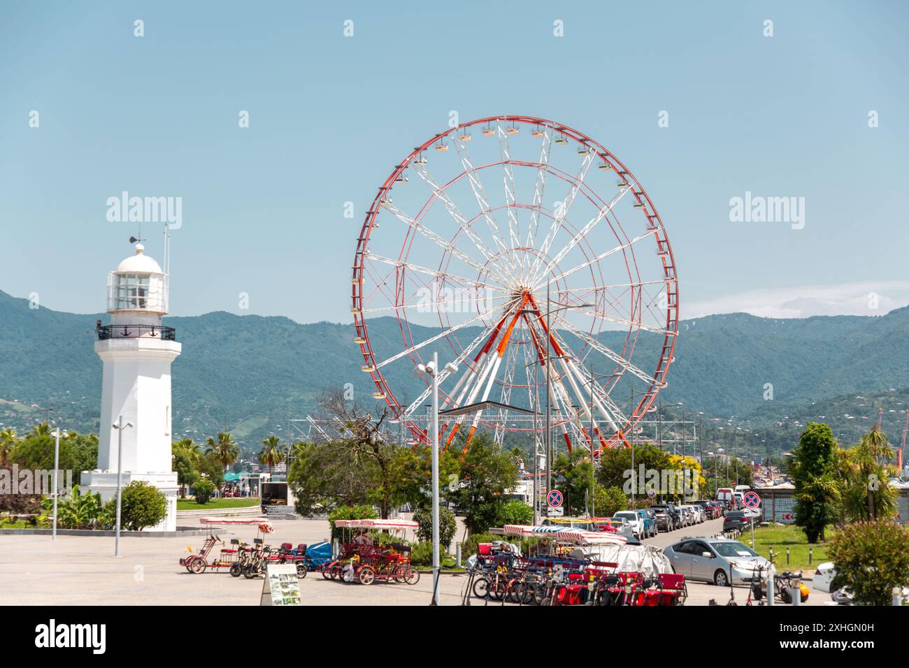 Batumi, Georgia - 13 JUNE 2024: The Ferris Wheel and the Lighthouse ...