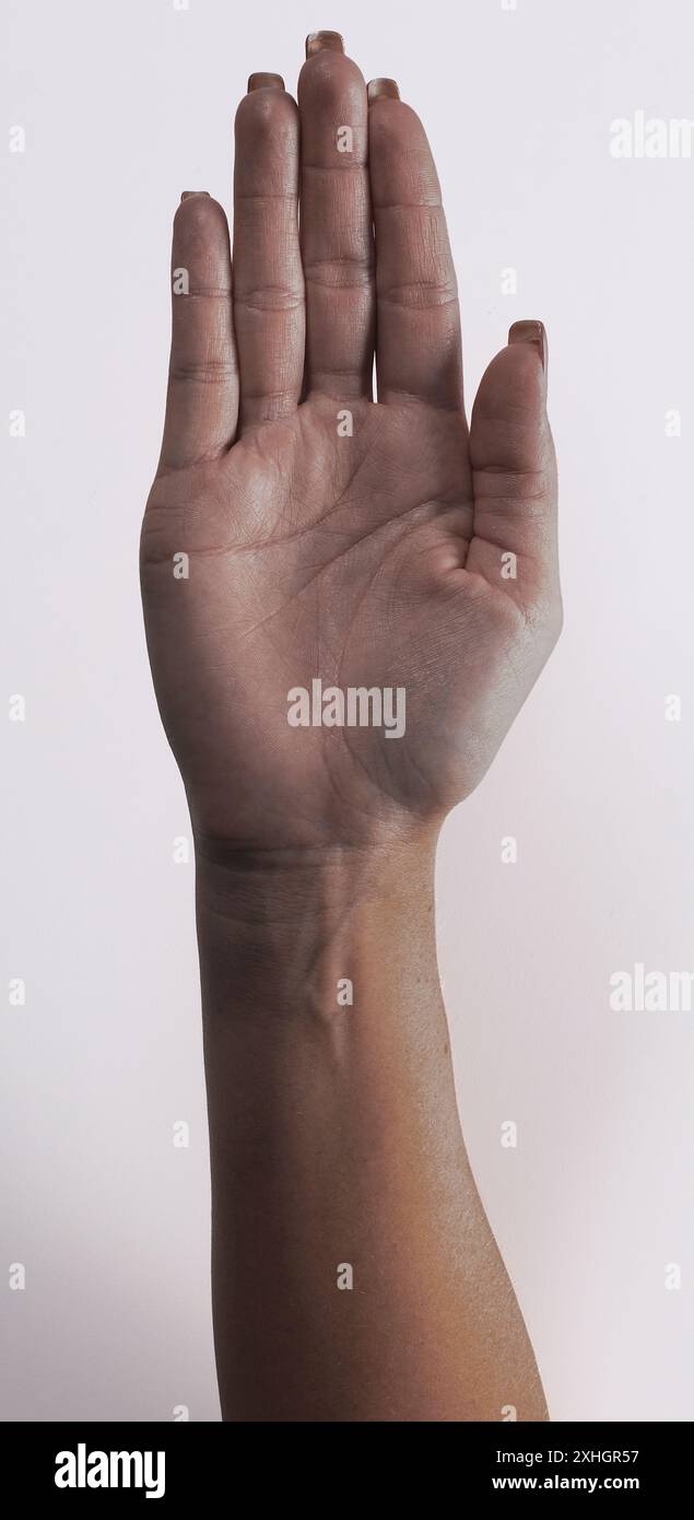 Raised Black African Hand Stock Photo - Alamy