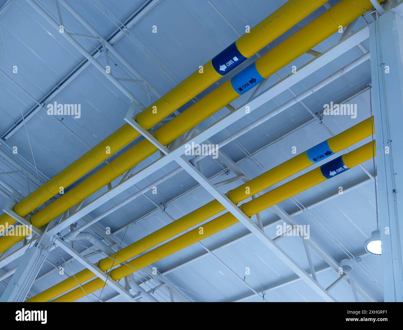 Ceiling with ventilation pipes and lights in industrial building Stock ...