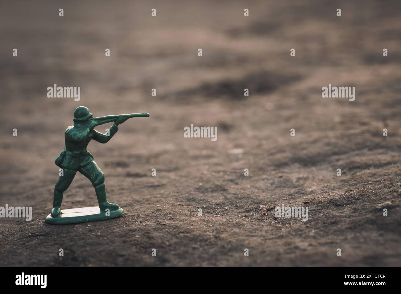 Image of a toy soldier outdoors. War concept, side view Stock Photo - Alamy