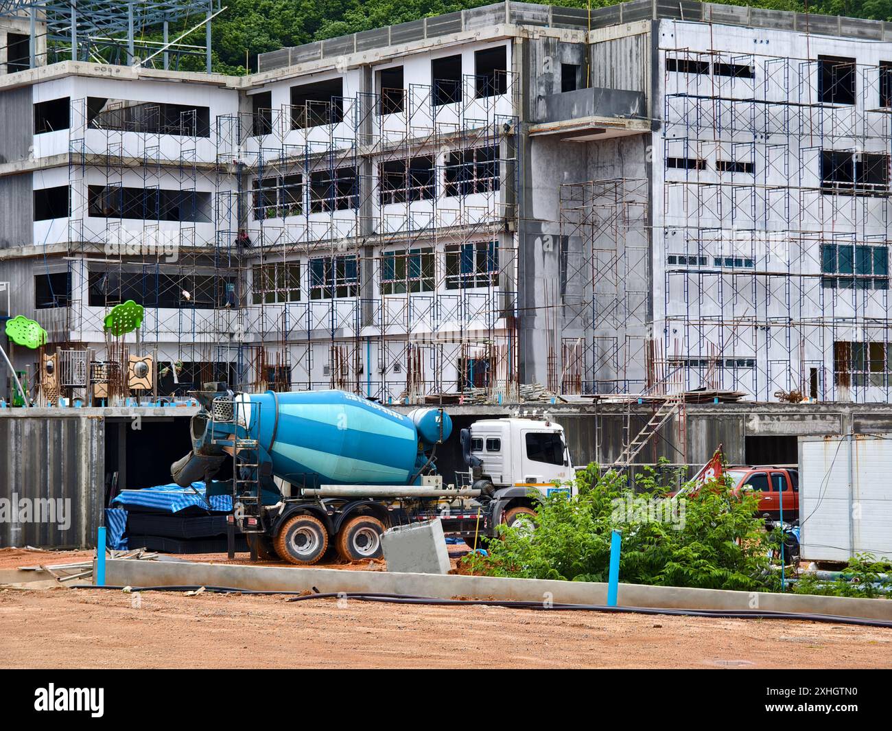 A tall building with numerous windows is being built Stock Photo - Alamy