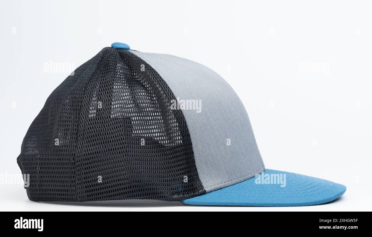 New cap hat side view blue and grey color isolated on studio background ...