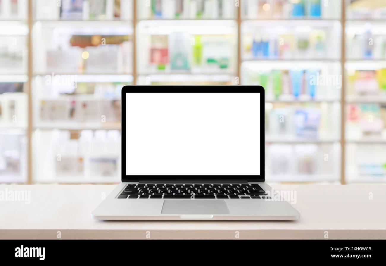 Laptop computer blank screen on pharmacy counter drugstore shop ...