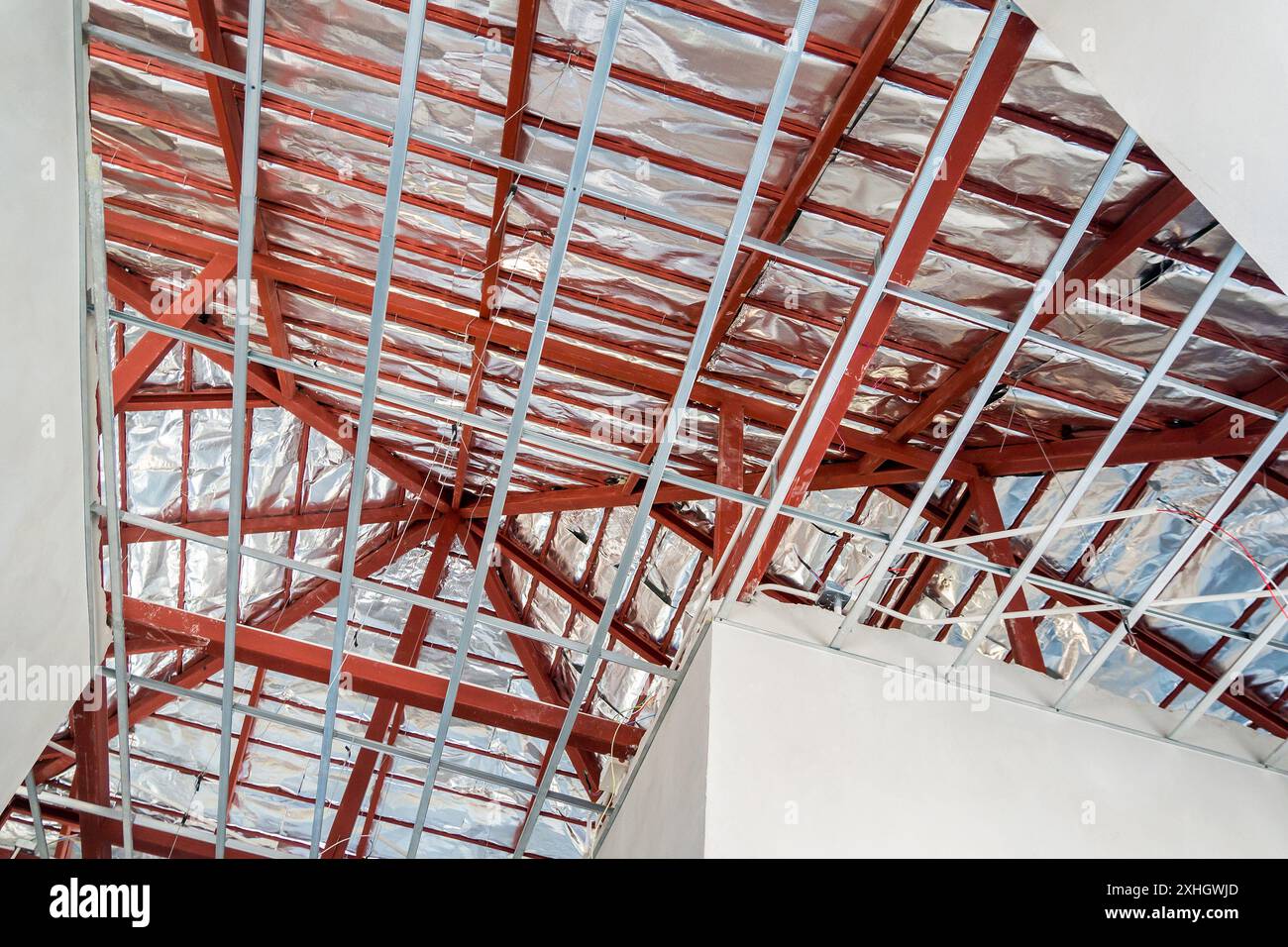 Install metal frame for plaster board ceiling at house under ...