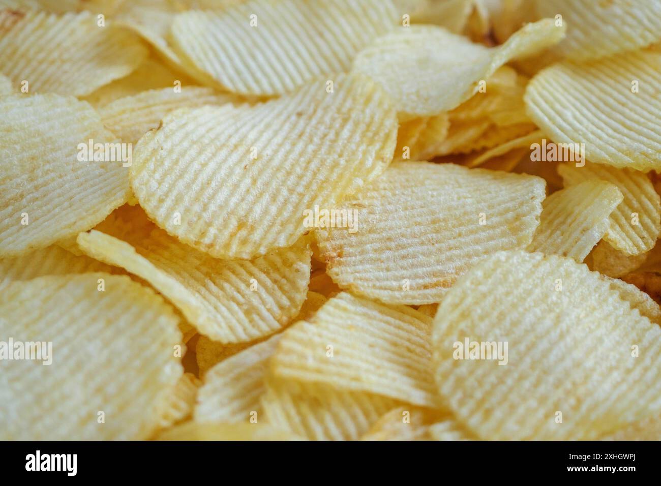 crispy potato chips snack texture background Stock Photo - Alamy