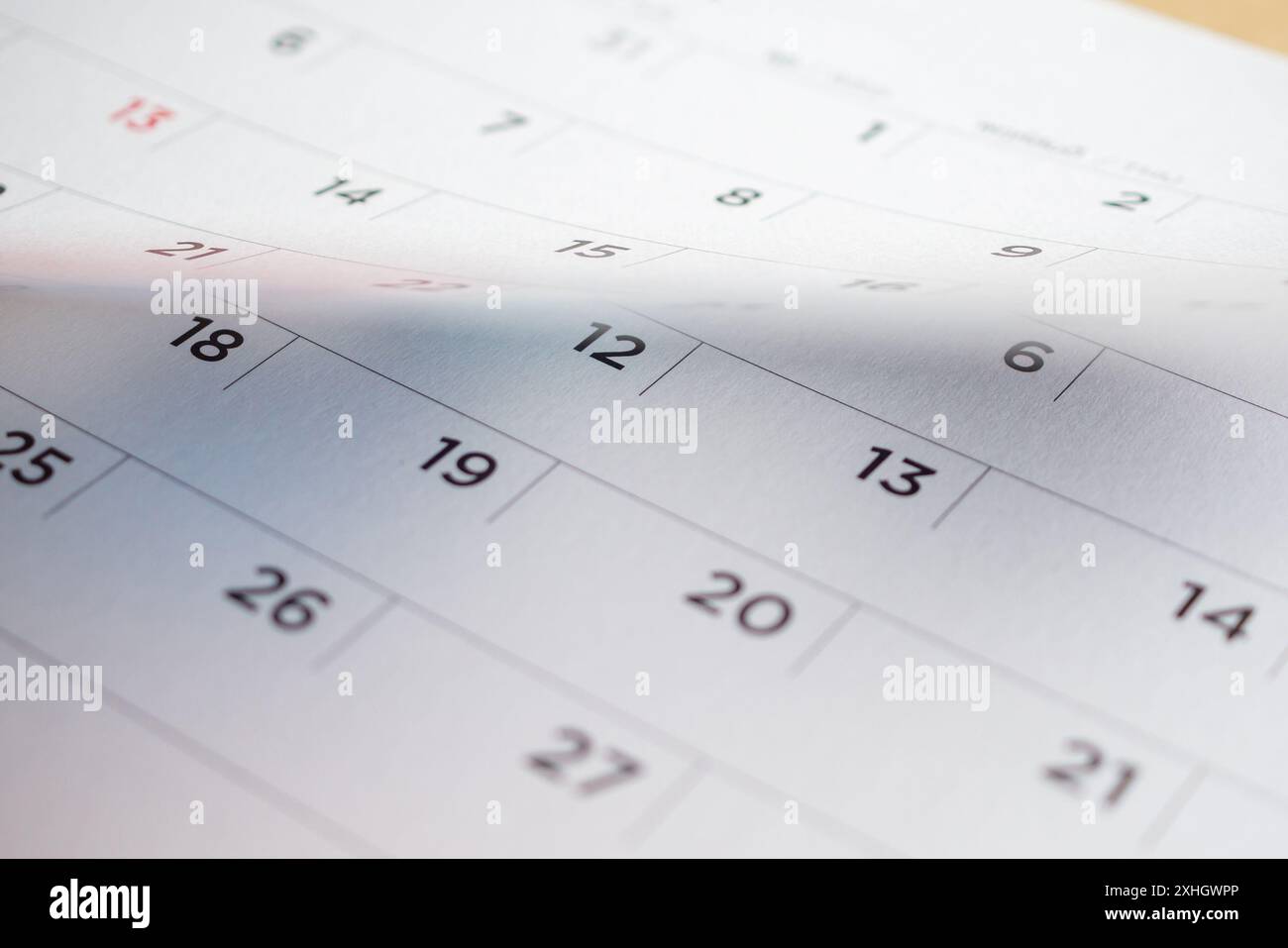 calendar page flipping sheet close up background Stock Photo - Alamy