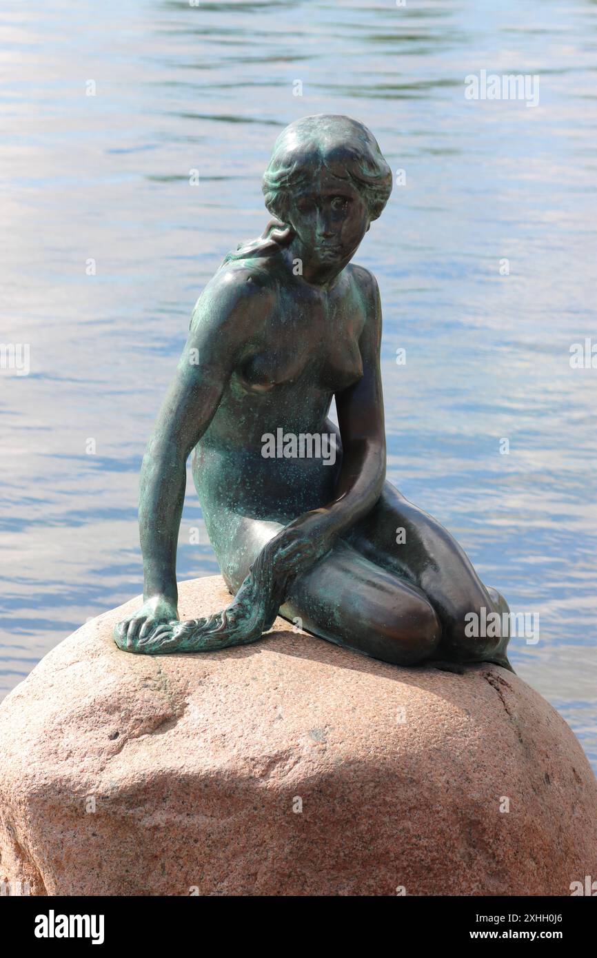 The Little Mermaid, a bronze statue by Edvard Eriksen, depicting a mermaid, Copenhagen, Denmark ...