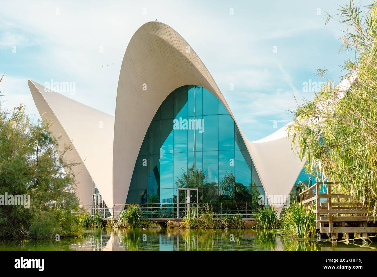 A striking example of modern architecture featuring sweeping curves and ...