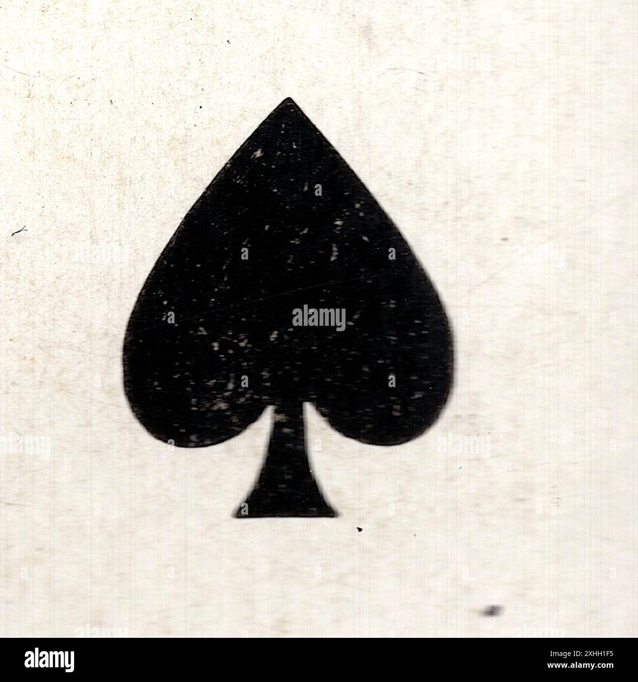 Close up of an antique playing card showing the spade symbol Stock ...
