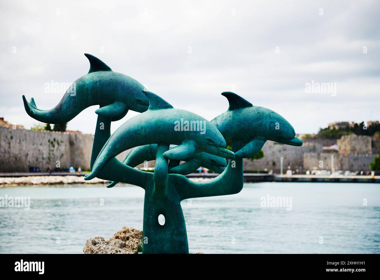 Dolphin statue by harbour, Old Town, City of Rhodes, Rhodes, Dodecanese ...