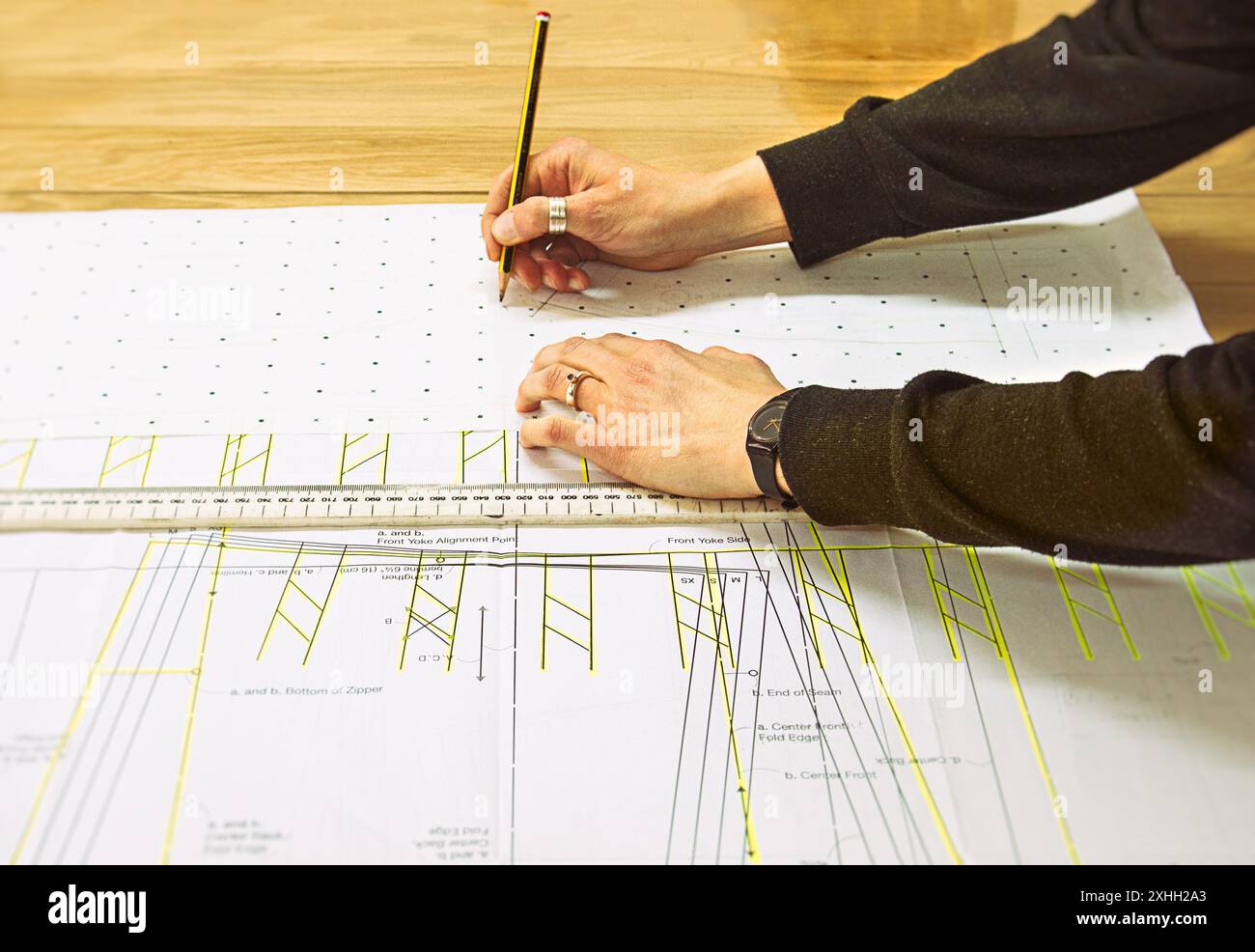 tracing out a pattern to make clothing to fit perfectly Stock Photo - Alamy