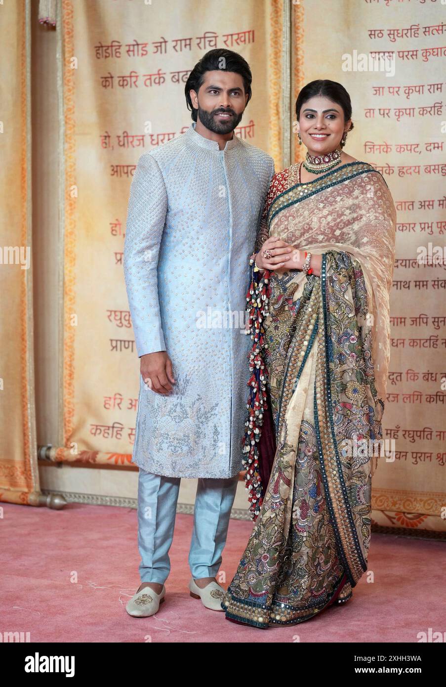 Indian cricketer Ravindra Jadeja poses for a photograph with his wife Rivaba Jadeja at the ...