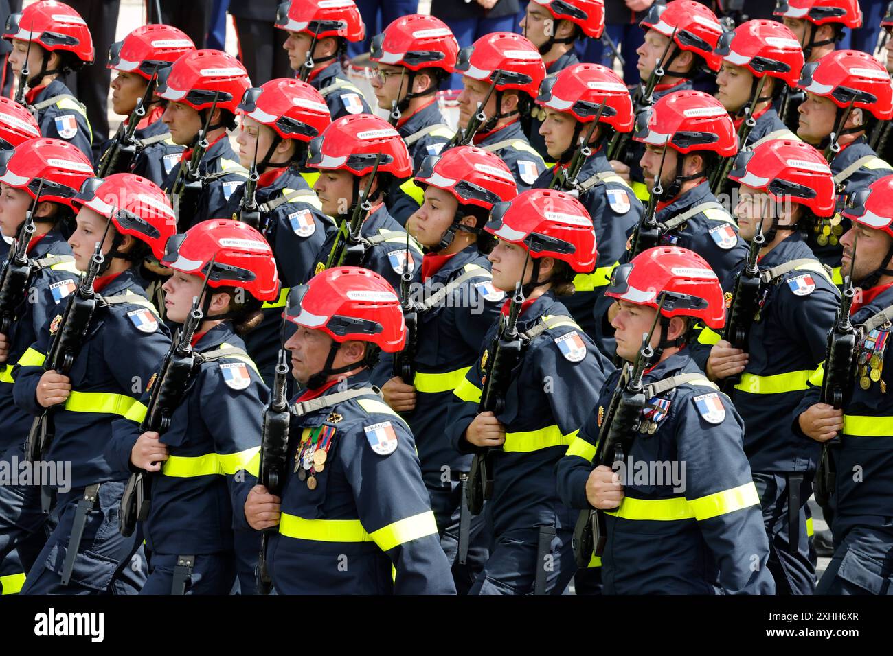 Paris, France. 14th July, 2024. Participants attend the annual Bastille ...