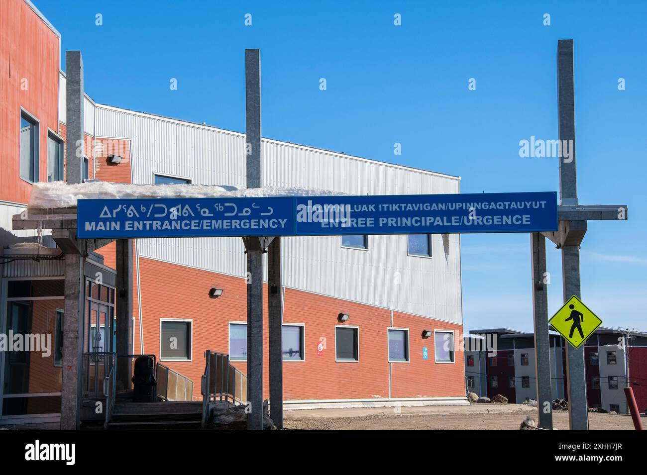Multilingual main entrance sign at Qikiqtani General Hospital on ...