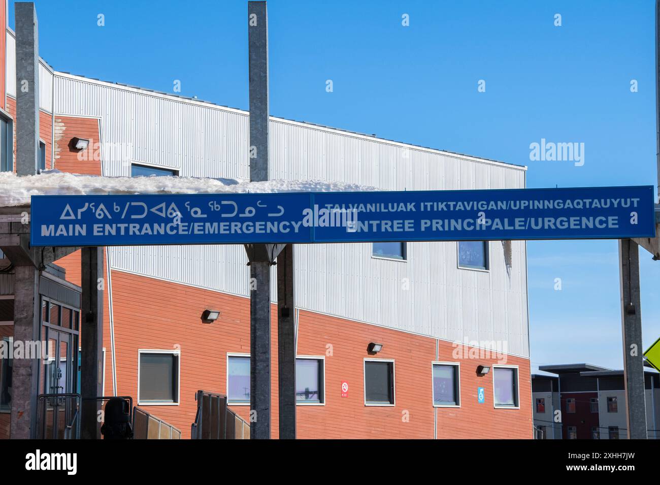 Multilingual main entrance sign at Qikiqtani General Hospital on ...
