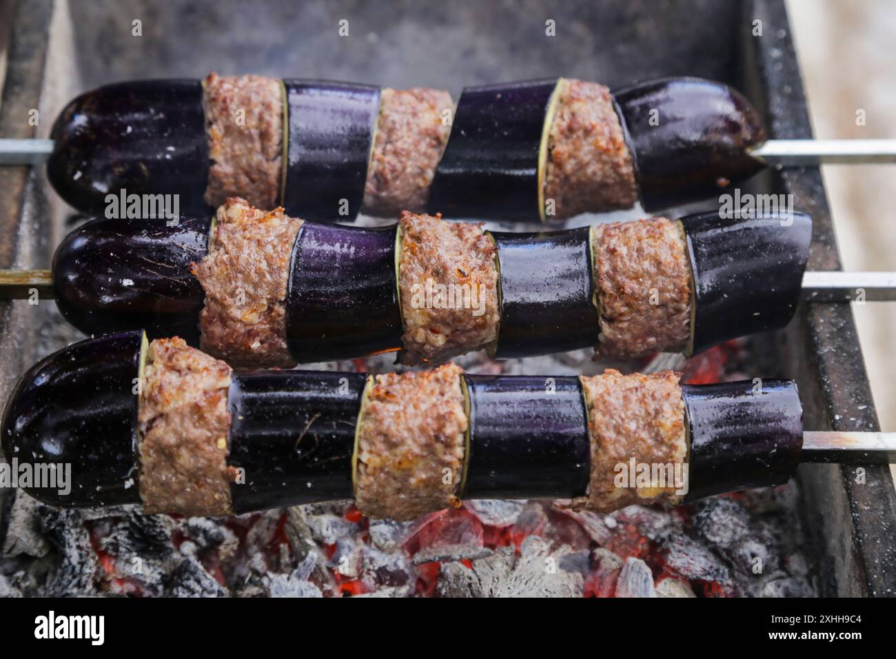 Eggplant kebab to barbecue. shish kebab cooked over coal fire Stock ...