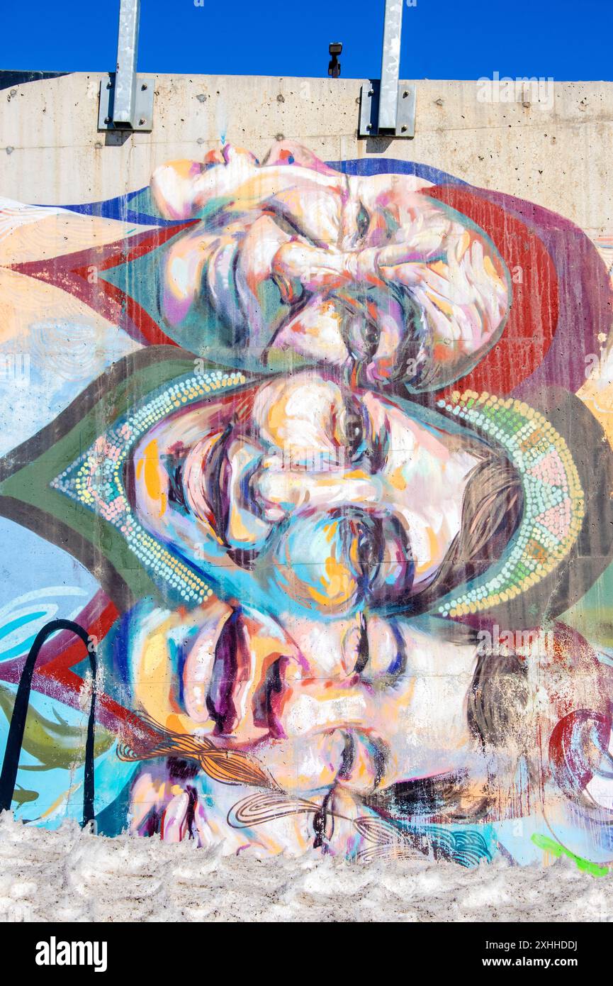 Three Inuit faces mural under the theme of "Come Together" at Qikiqtani ...