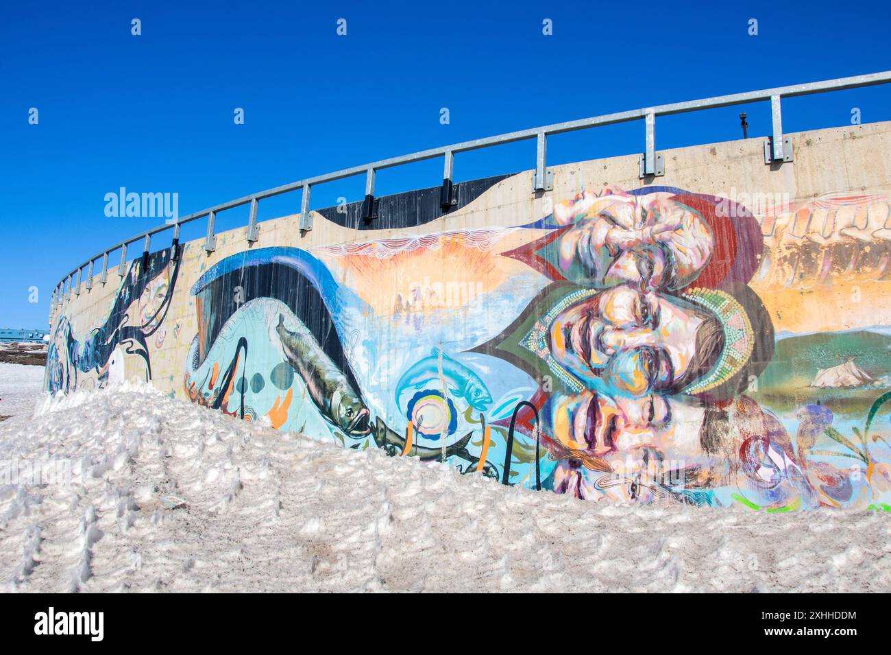 Three Inuit faces mural under the theme of "Come Together" at Qikiqtani ...