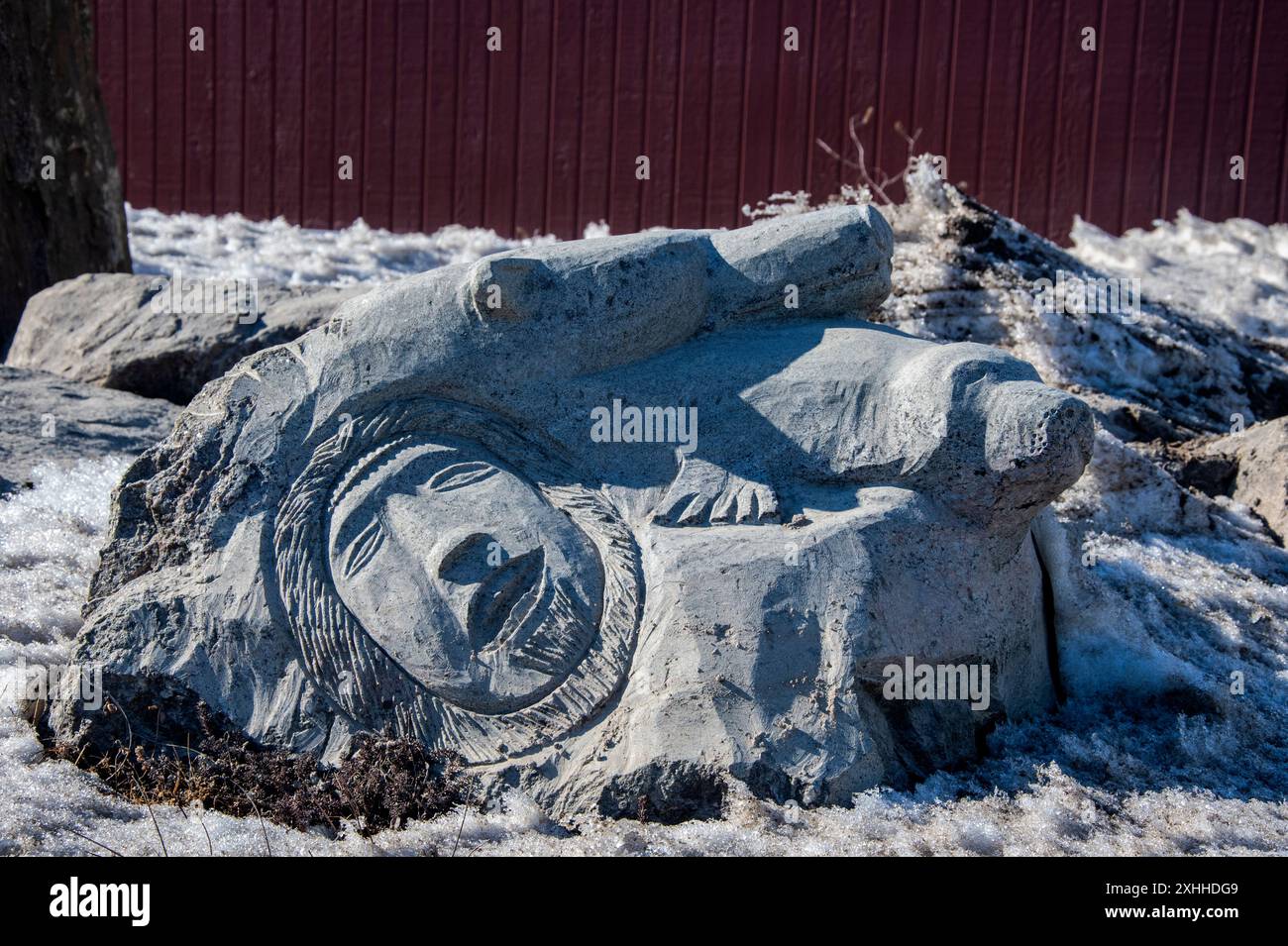 Sculpture stone carving of Inuit face and seals on Queen Elizabeth Way ...