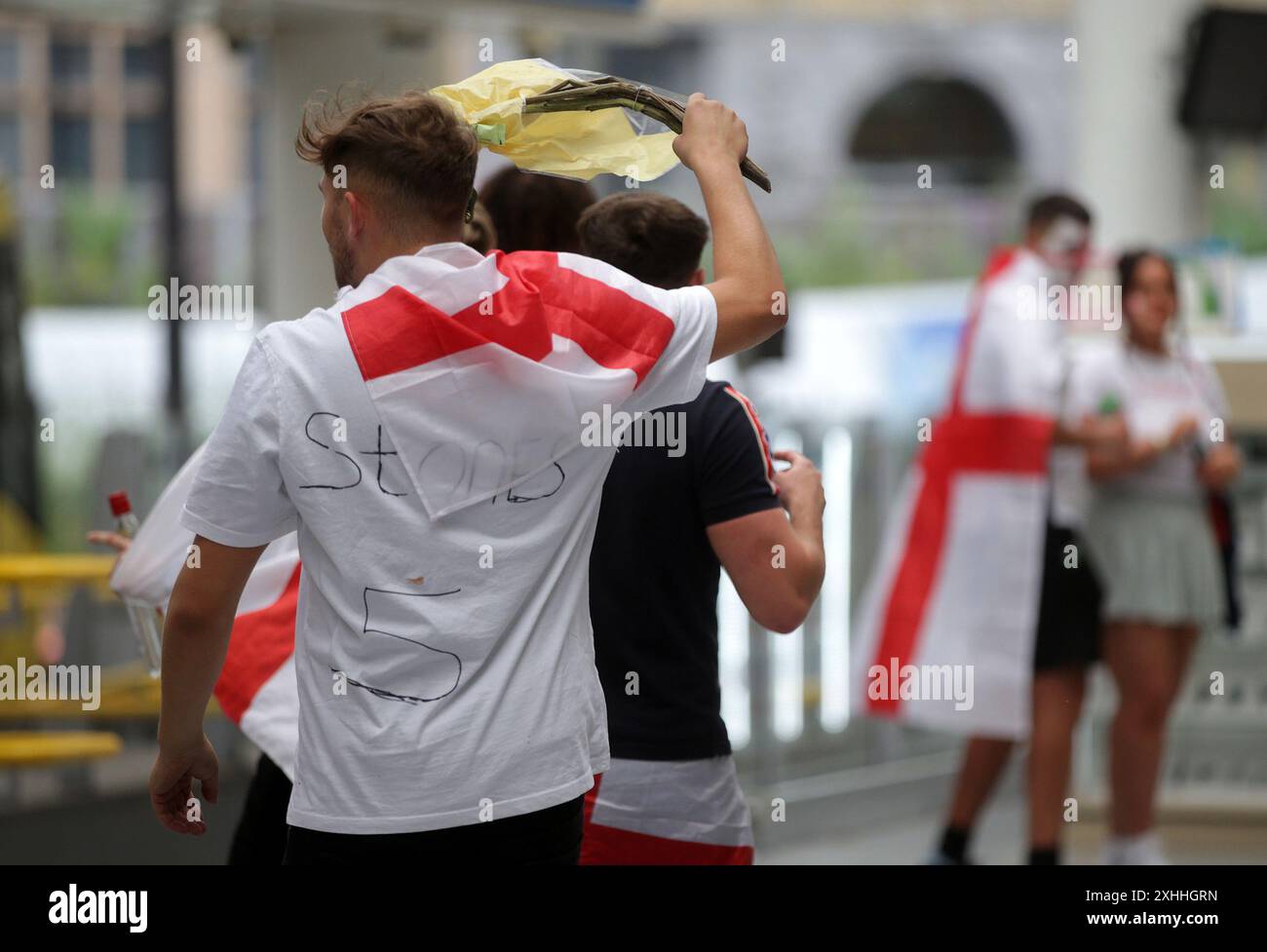 England fans at Victoria train station, Manchester. Picture date ...