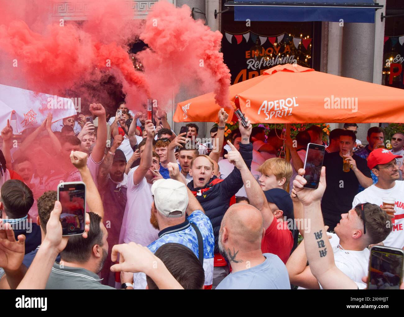 London, England, UK. 14th July, 2024. England fans set off smoke flares ...