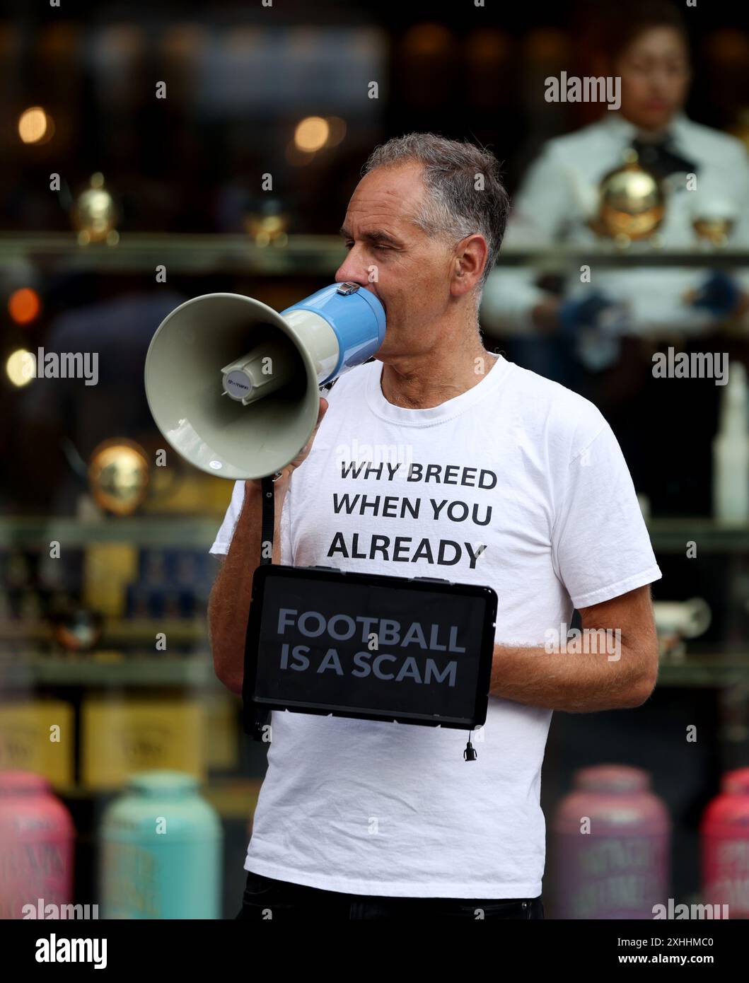 A street preacher displays an anti-football message ahead of the UEFA ...