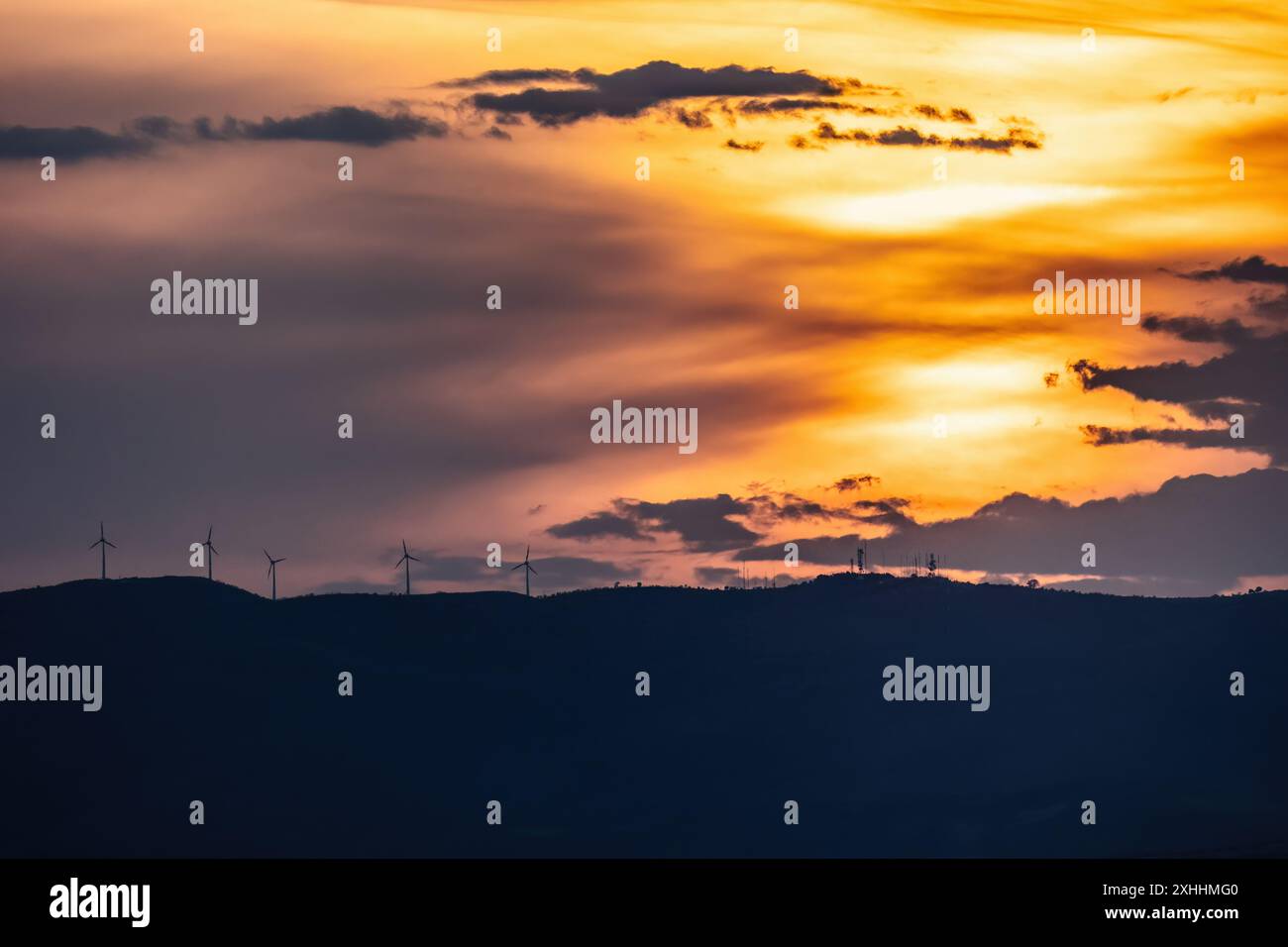 Wind turbines on the mountain near to wetland National Park Delta Evros ...