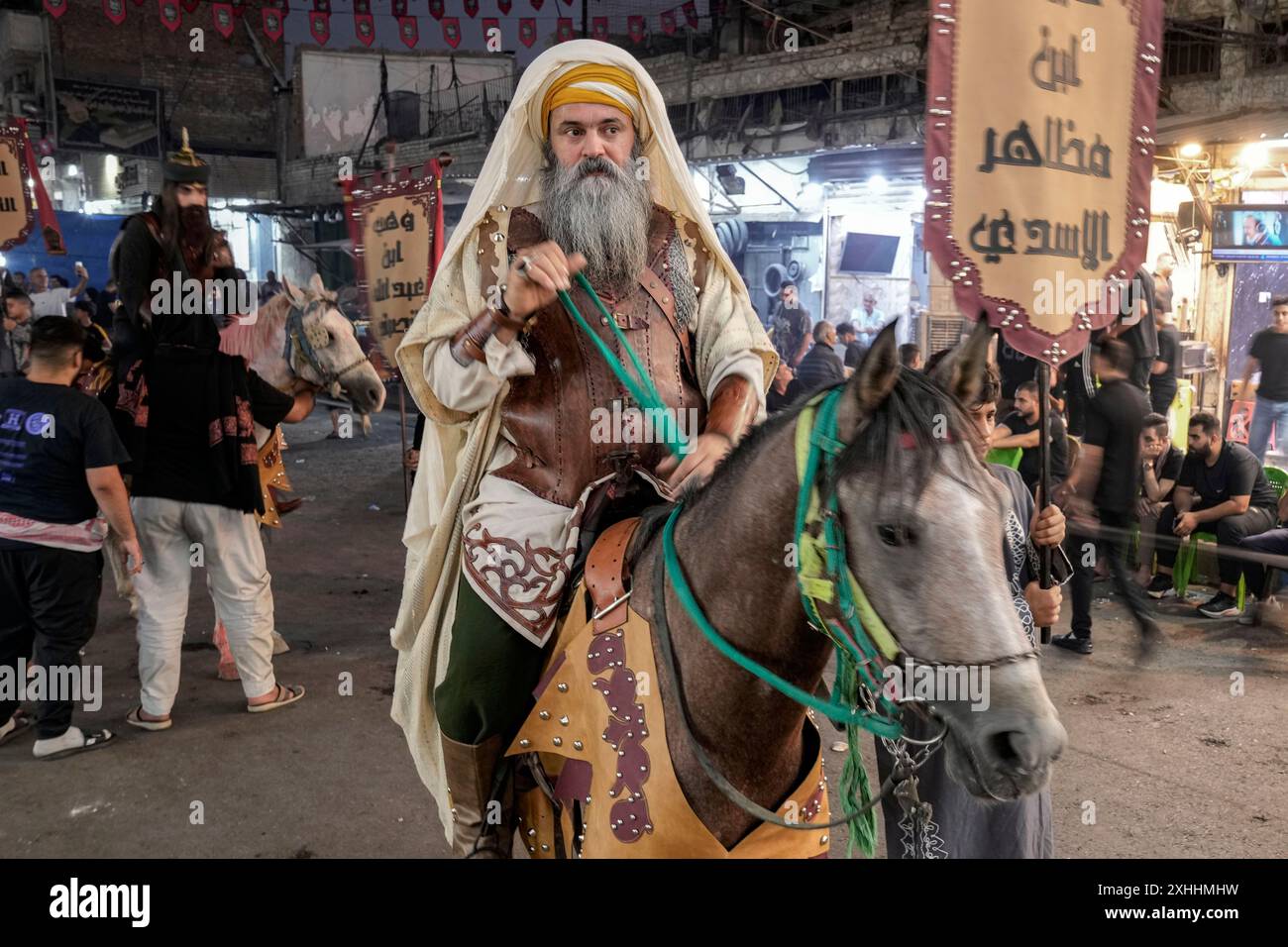 Iraqi Shiite wear traditional clothes to perform the epic of Imam ...