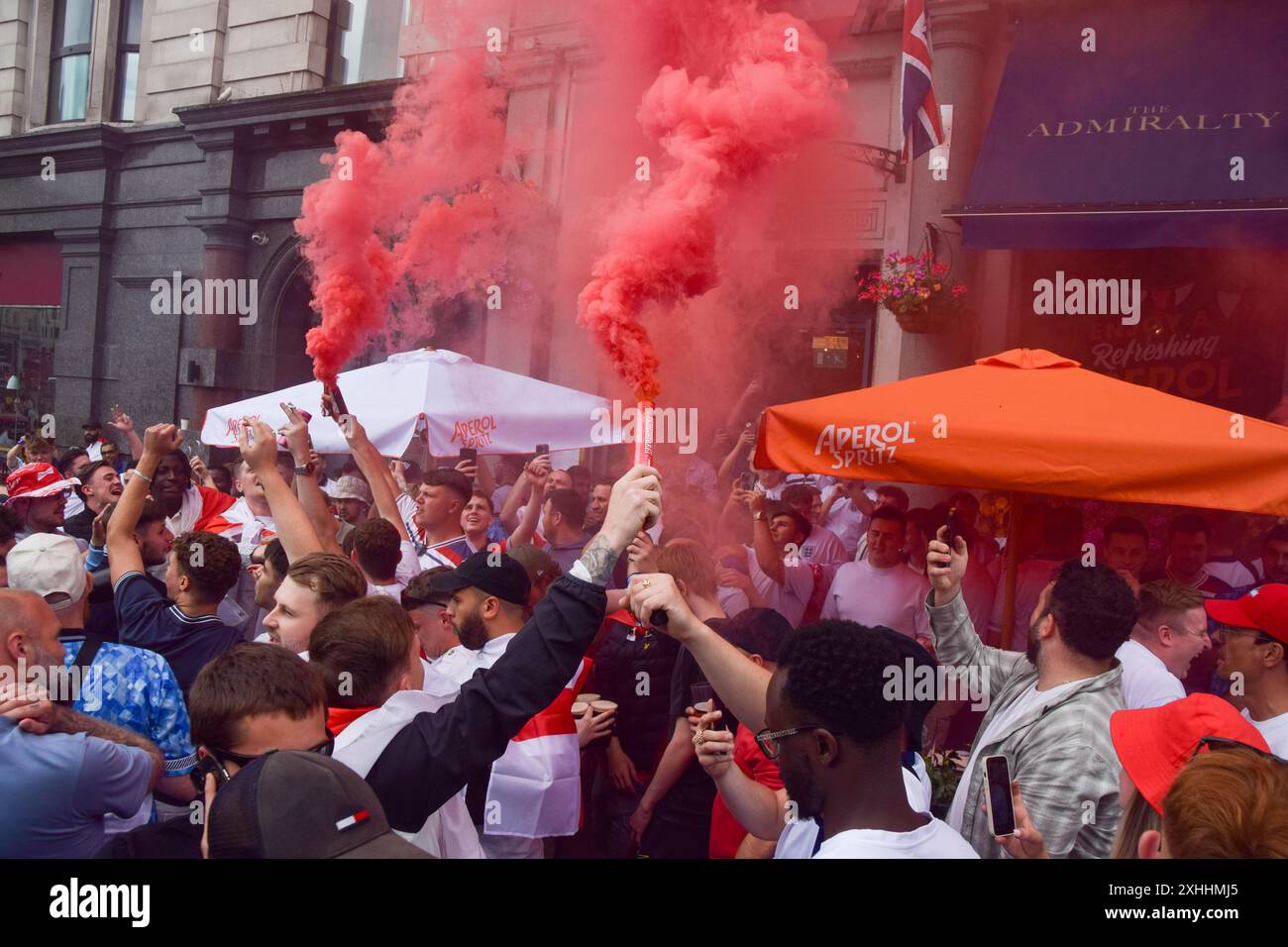 London, UK. 14th July 2024. England fans set off smoke flares outside ...